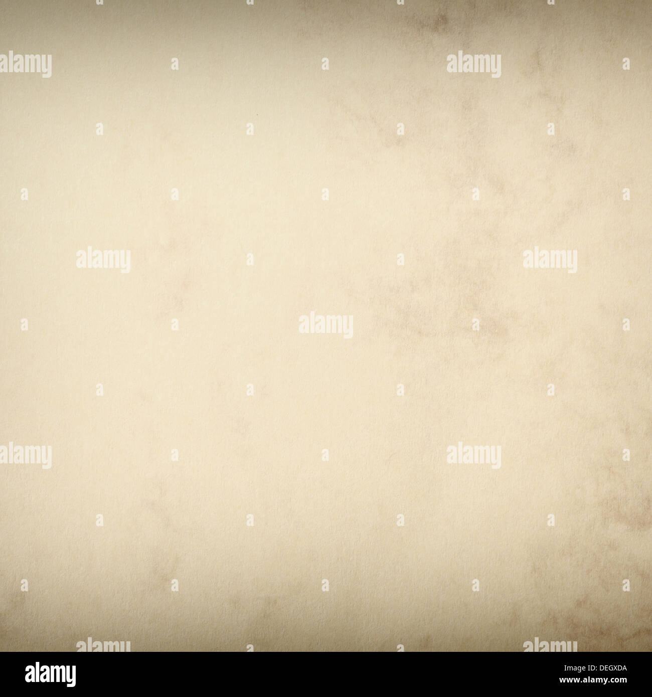 Vintage poster paper texture with a glowing center and grunge vignette ...