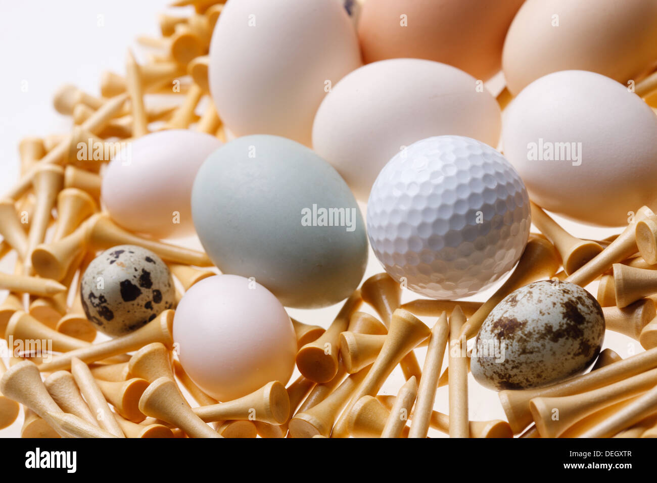Eggs,golf ball and tees Stock Photo - Alamy