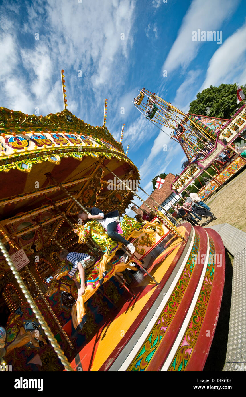An old fashioned fun fair on an English summer's day Stock Photo - Alamy