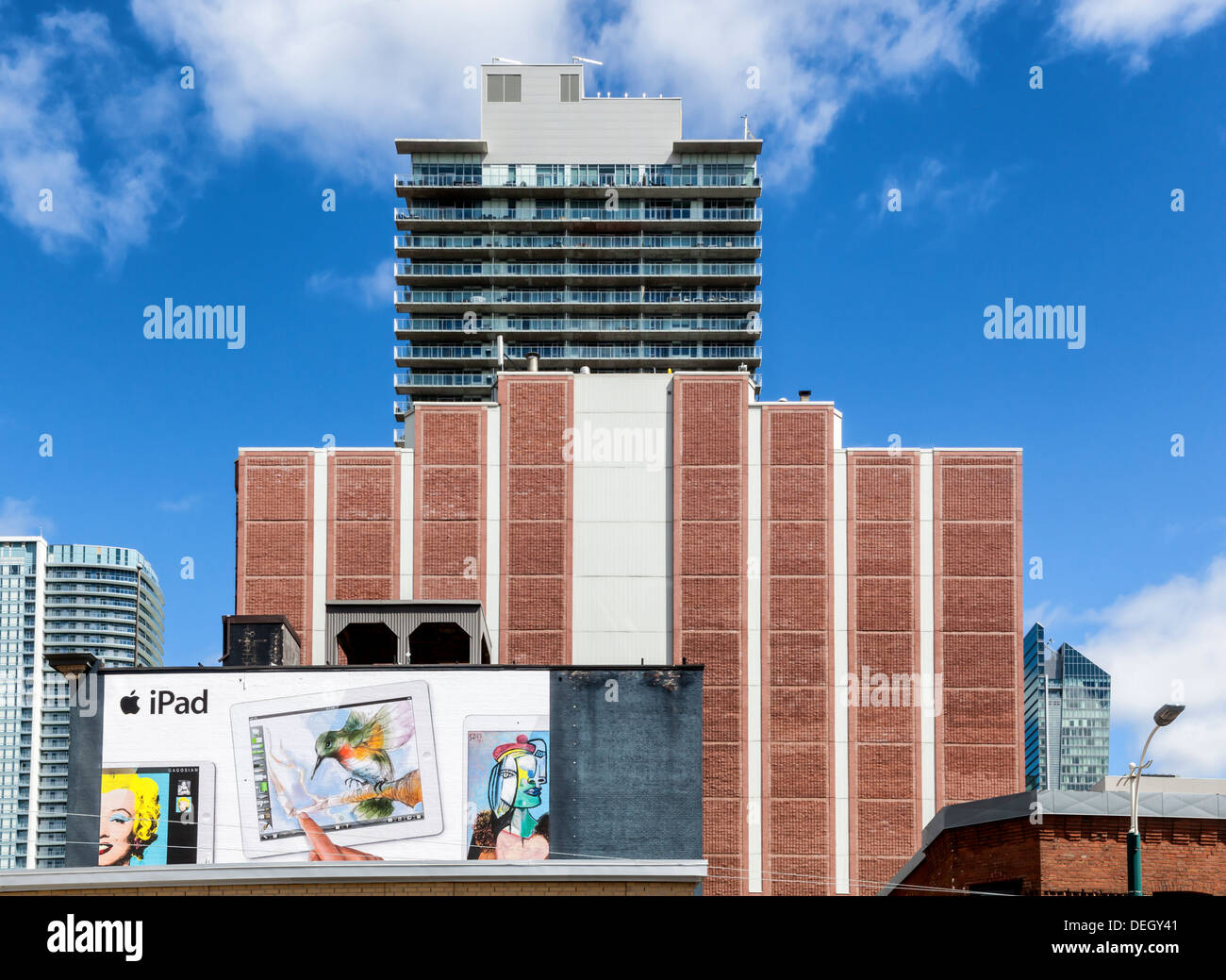 Apple I-pad advertisement on a billboard against a building in Toronto ...