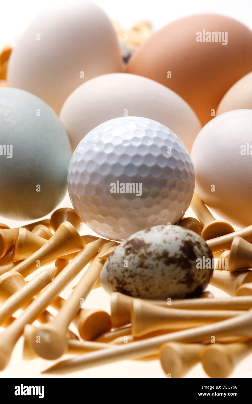 Eggs,golf ball and tees Stock Photo - Alamy