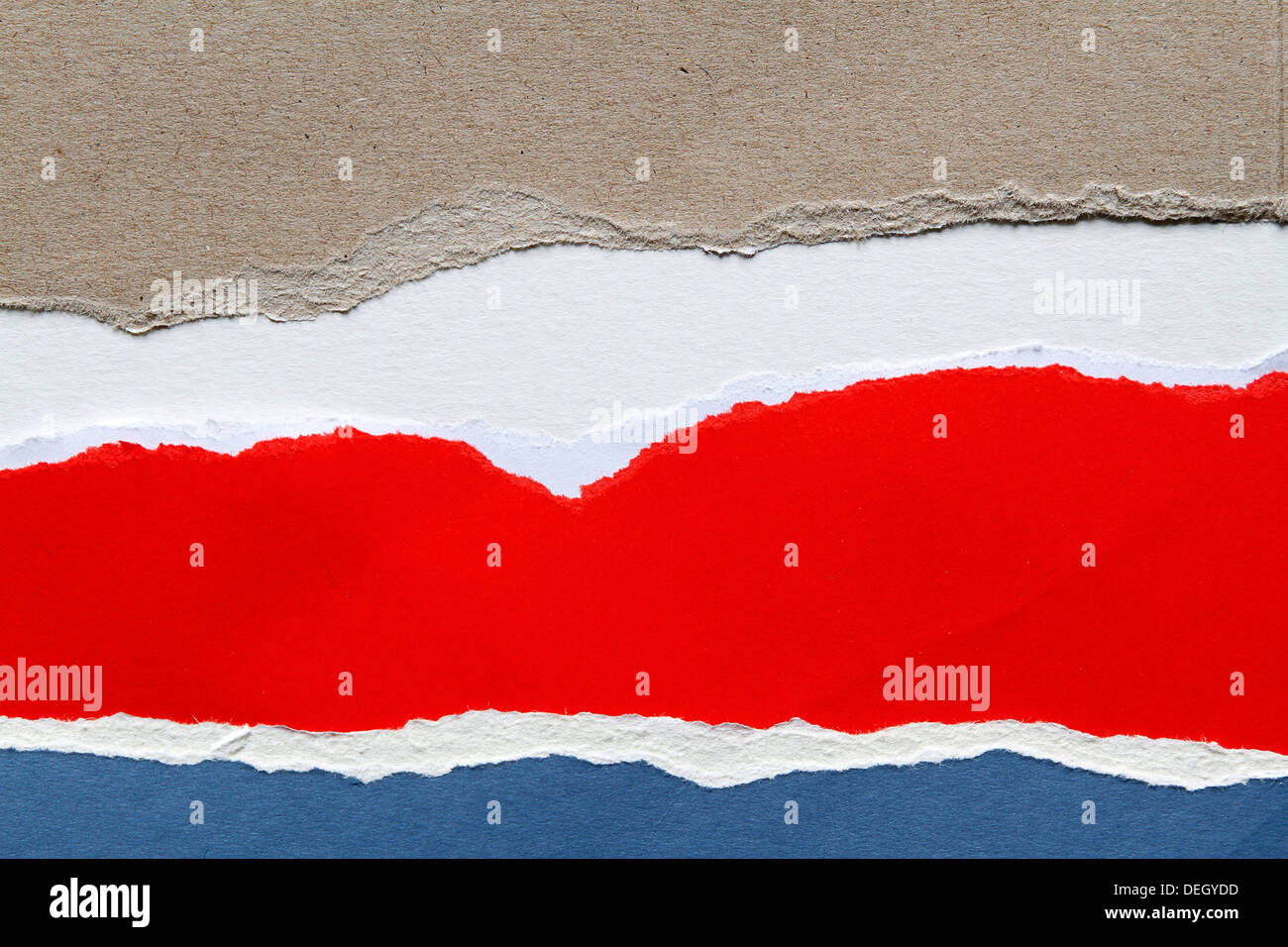 Closeup of various pieces of ripped paper Stock Photo - Alamy