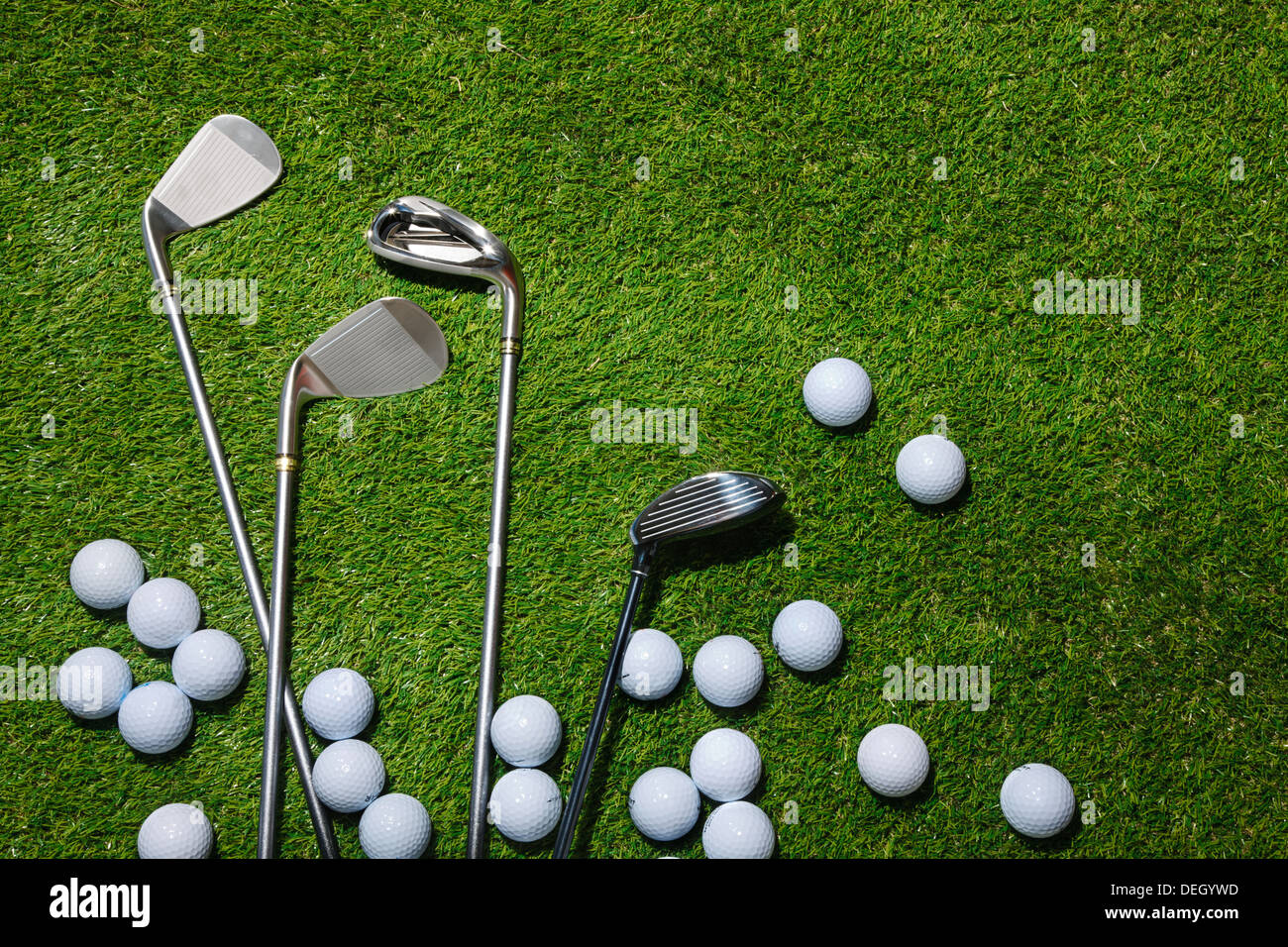 Golf clubs and balls Stock Photo - Alamy