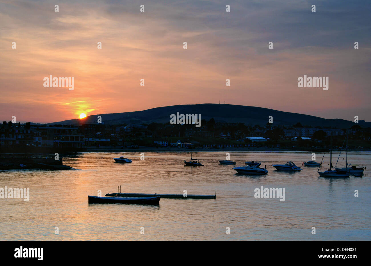 UK,Dorset,Swanage,Sunset over Swanage & Purbeck Hills Stock Photo - Alamy