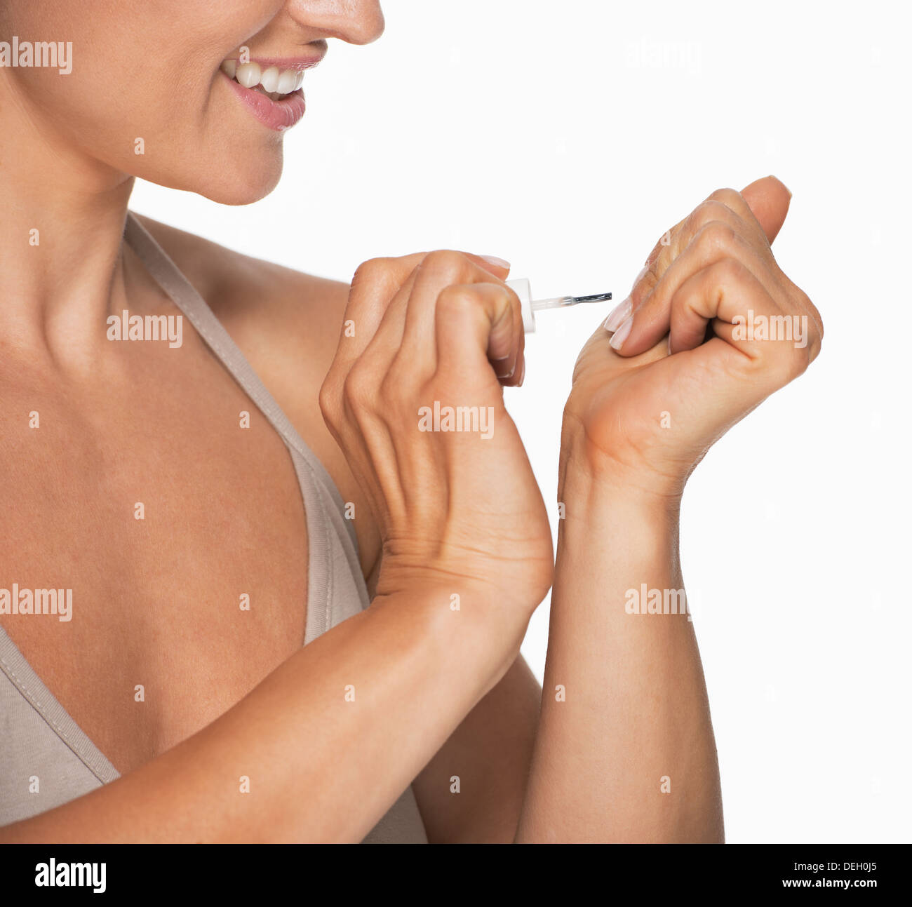 Closeup on woman using nail polish Stock Photo - Alamy