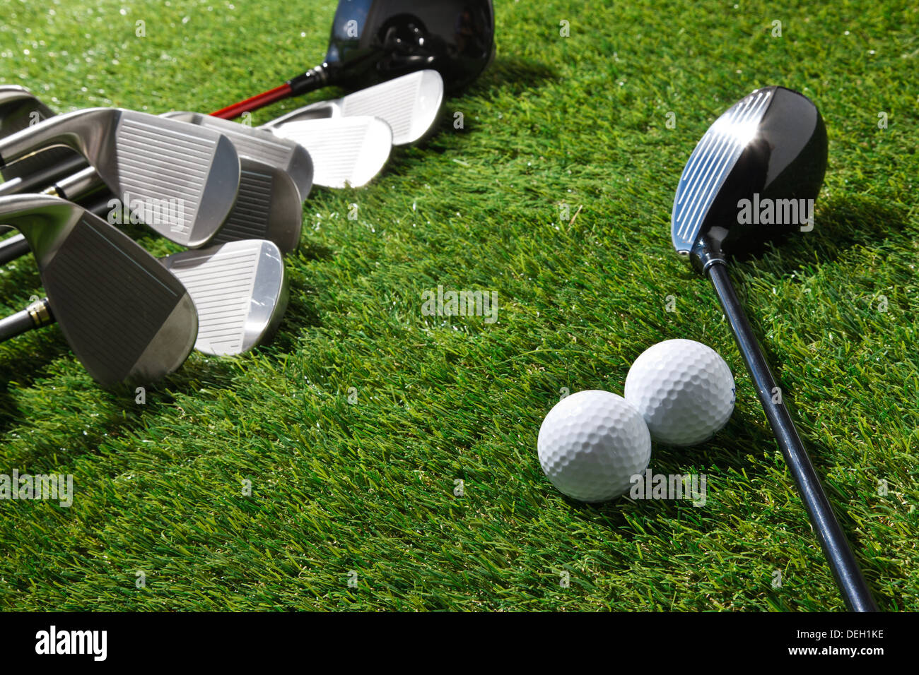 Golf clubs and balls Stock Photo - Alamy
