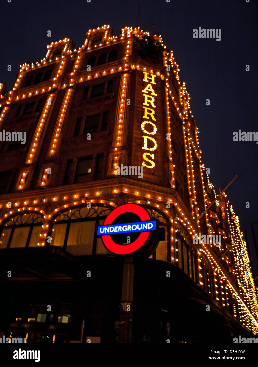 Harrods Department Store at night showing London Underground sign ...