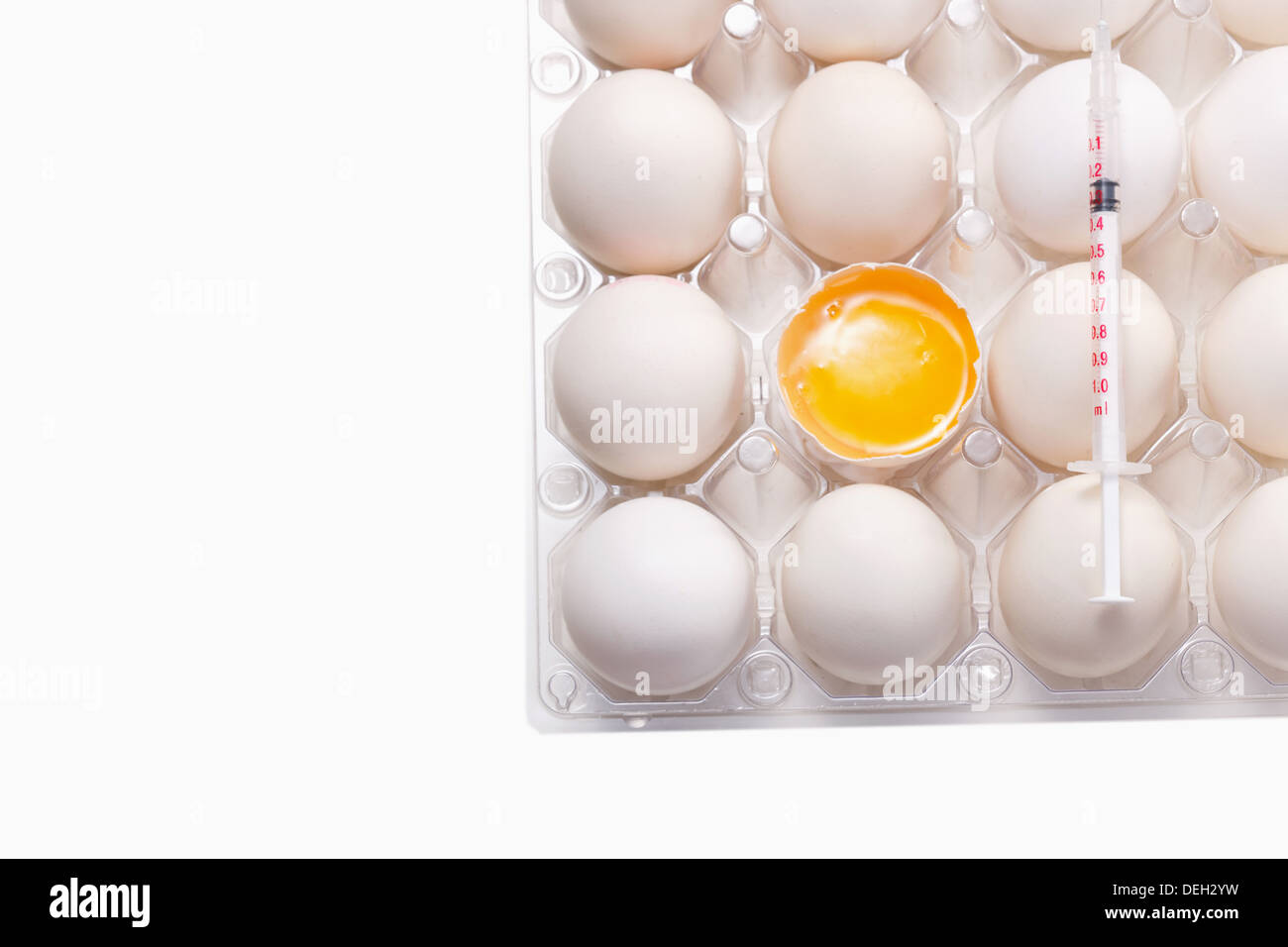 Eggs and injector Stock Photo - Alamy