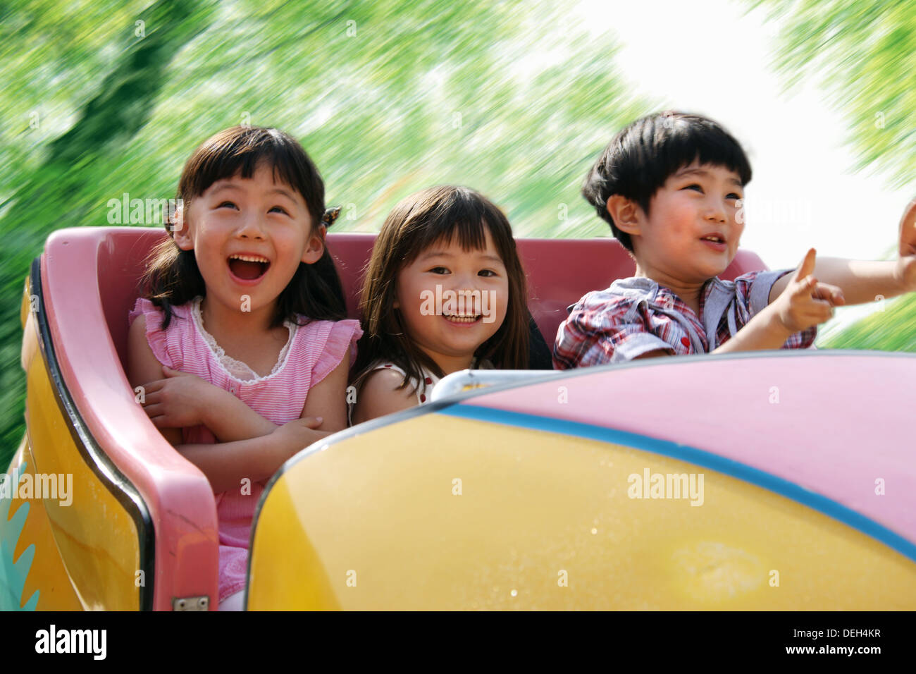 Oriental children playing outdoors Stock Photo - Alamy