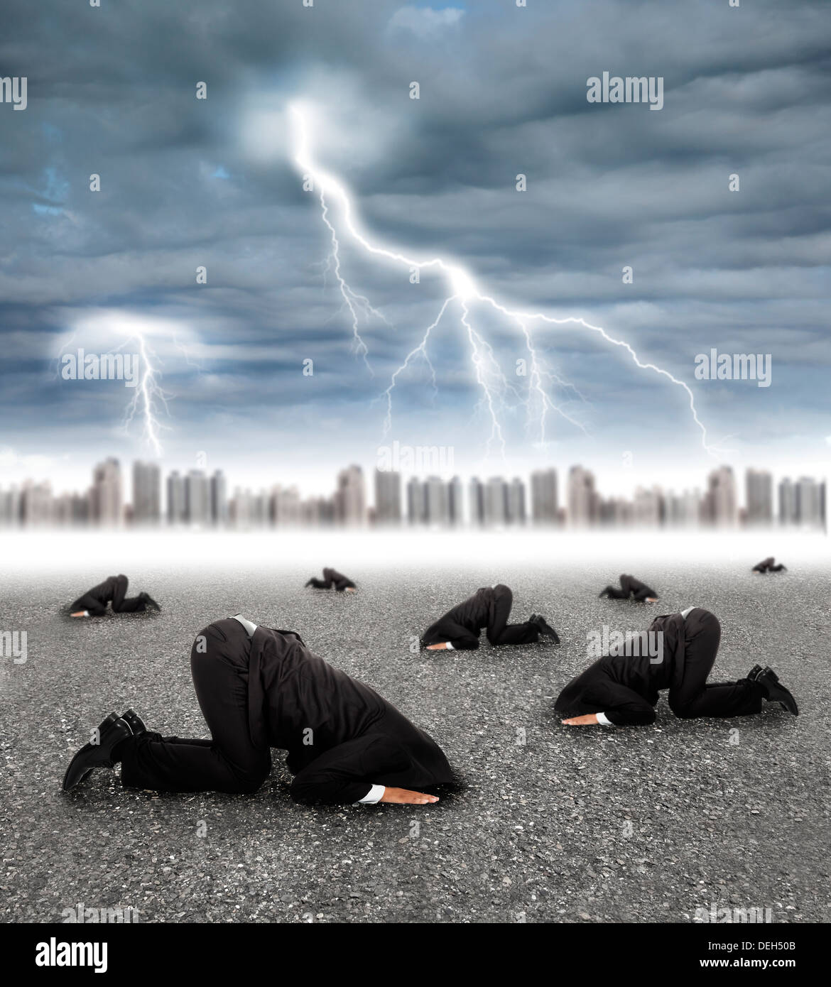 scared businessman hiding on the ground with storm coming Stock Photo ...