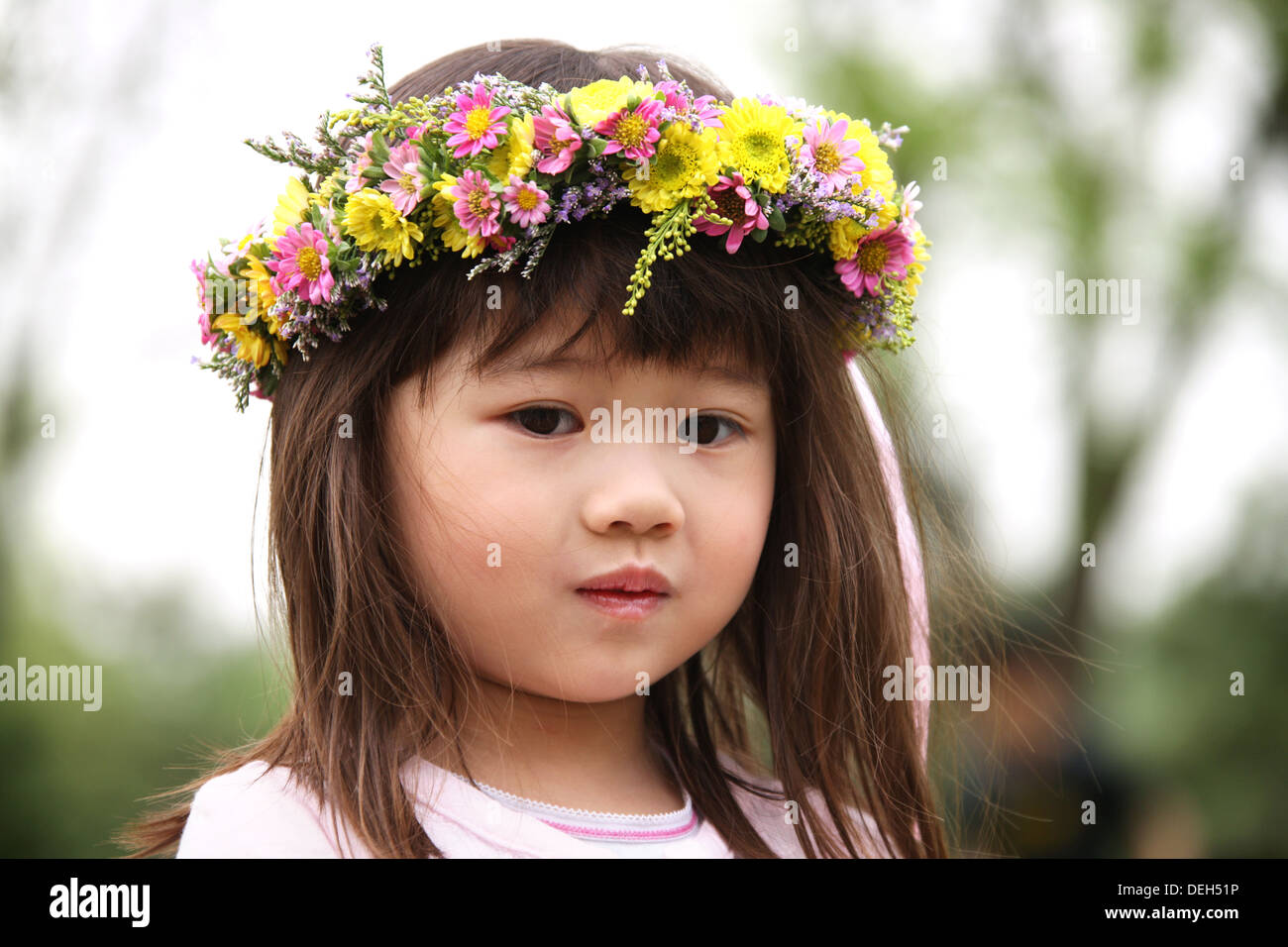 A girl playing outside Stock Photo - Alamy