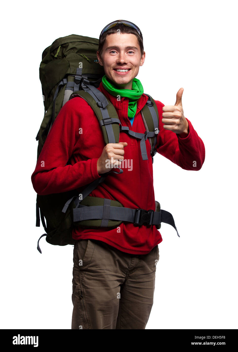 Full length portrait of a hiker with backpack posing isolated on white ...