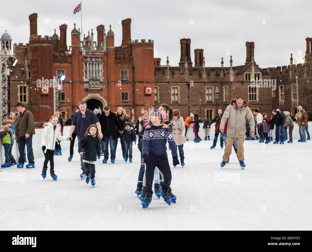 People enjoy Ice skating at temporary winter ice rink in front of ...