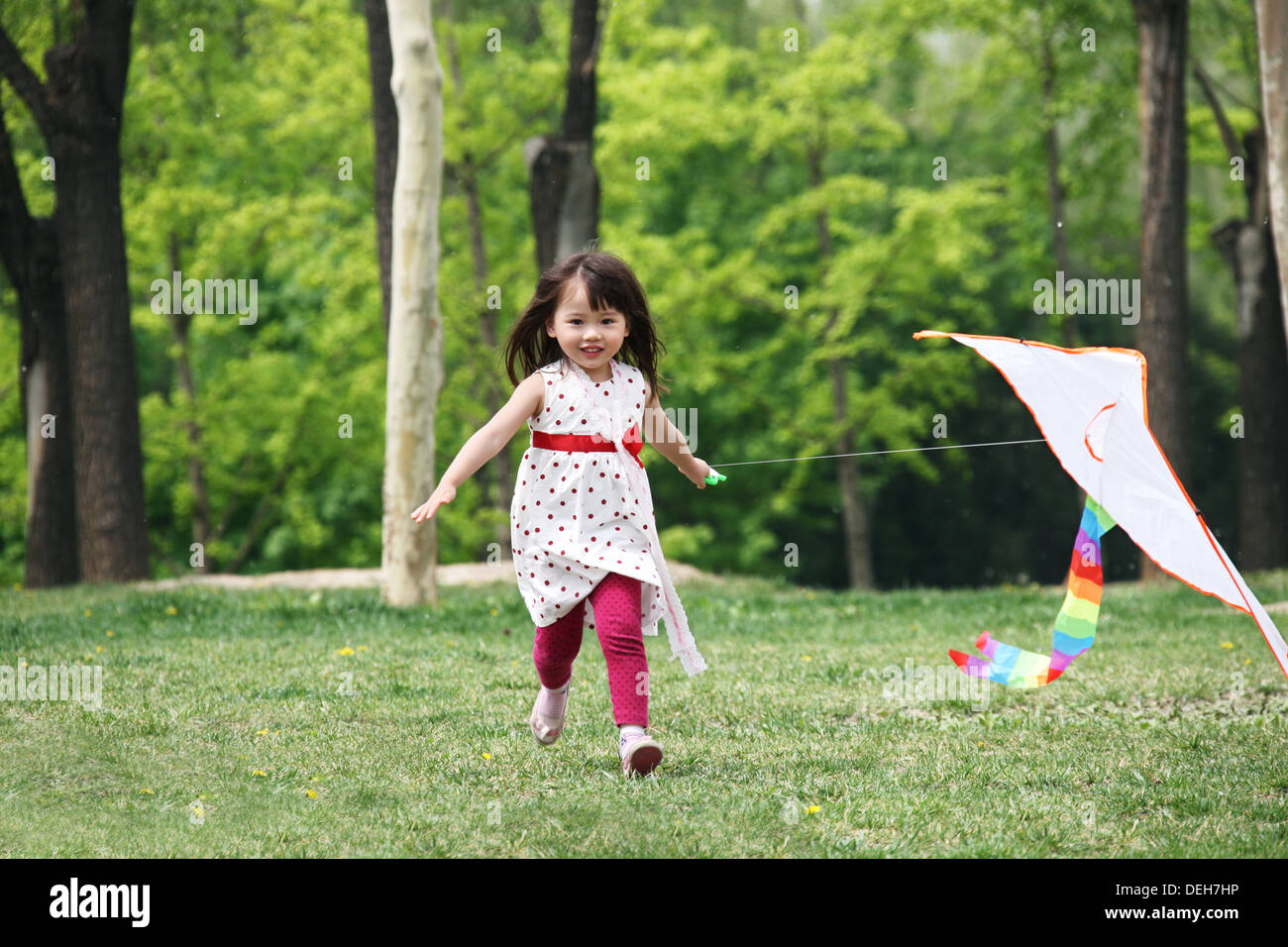 Girl kite garden hi-res stock photography and images - Alamy