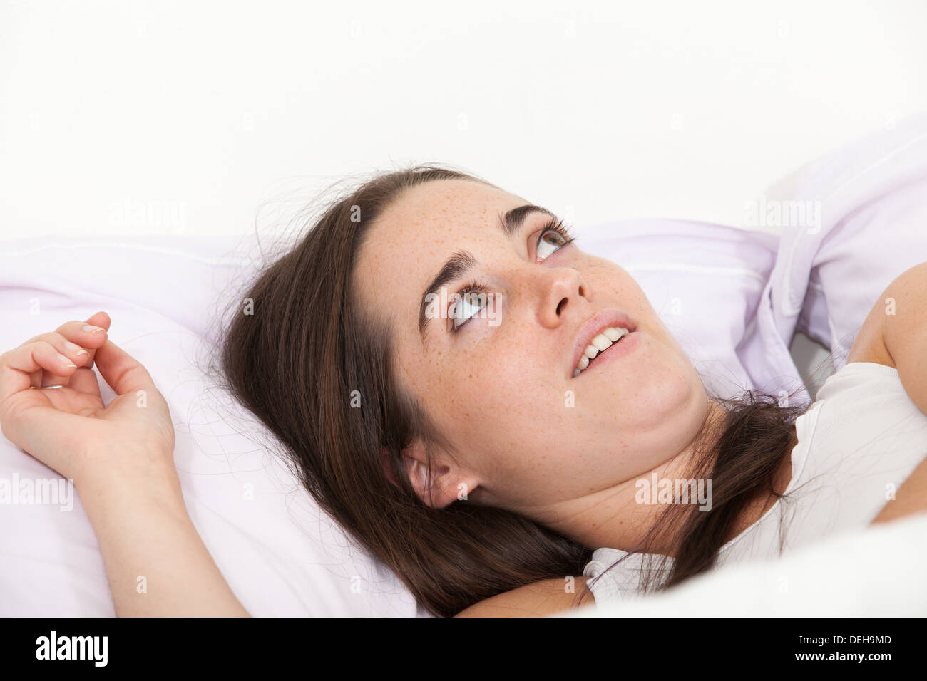 beautiful woman waking up Stock Photo - Alamy