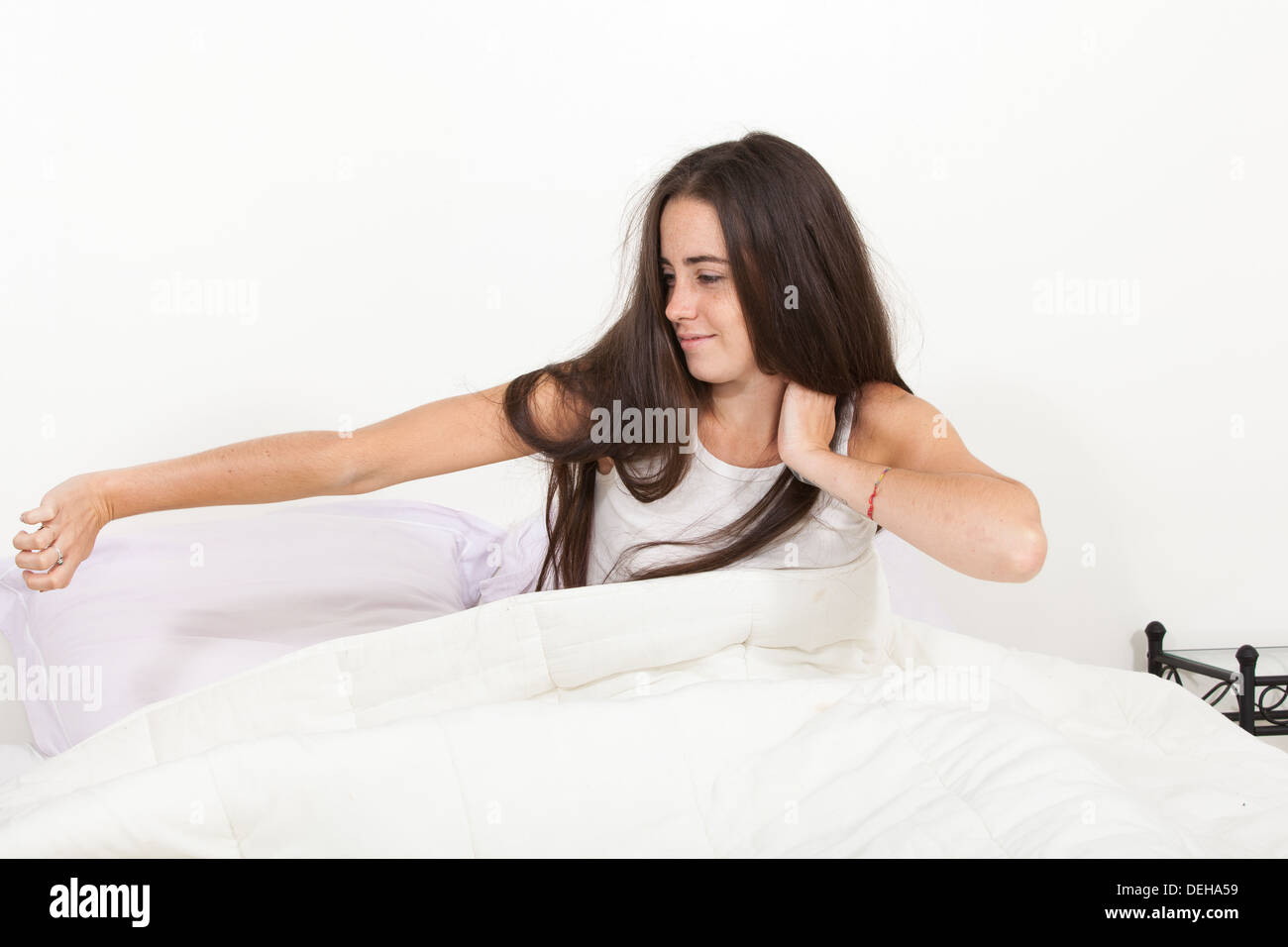 beautiful woman waking up Stock Photo - Alamy