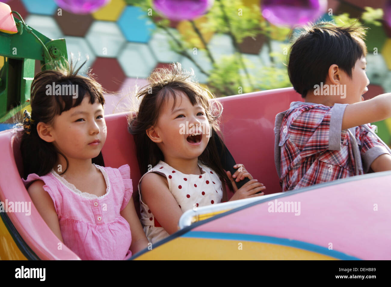 Oriental children playing outdoors Stock Photo - Alamy