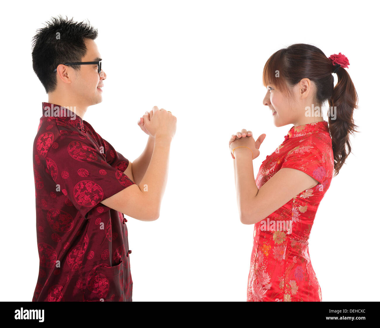Side view Asian man and woman with Chinese traditional dress cheongsam ...