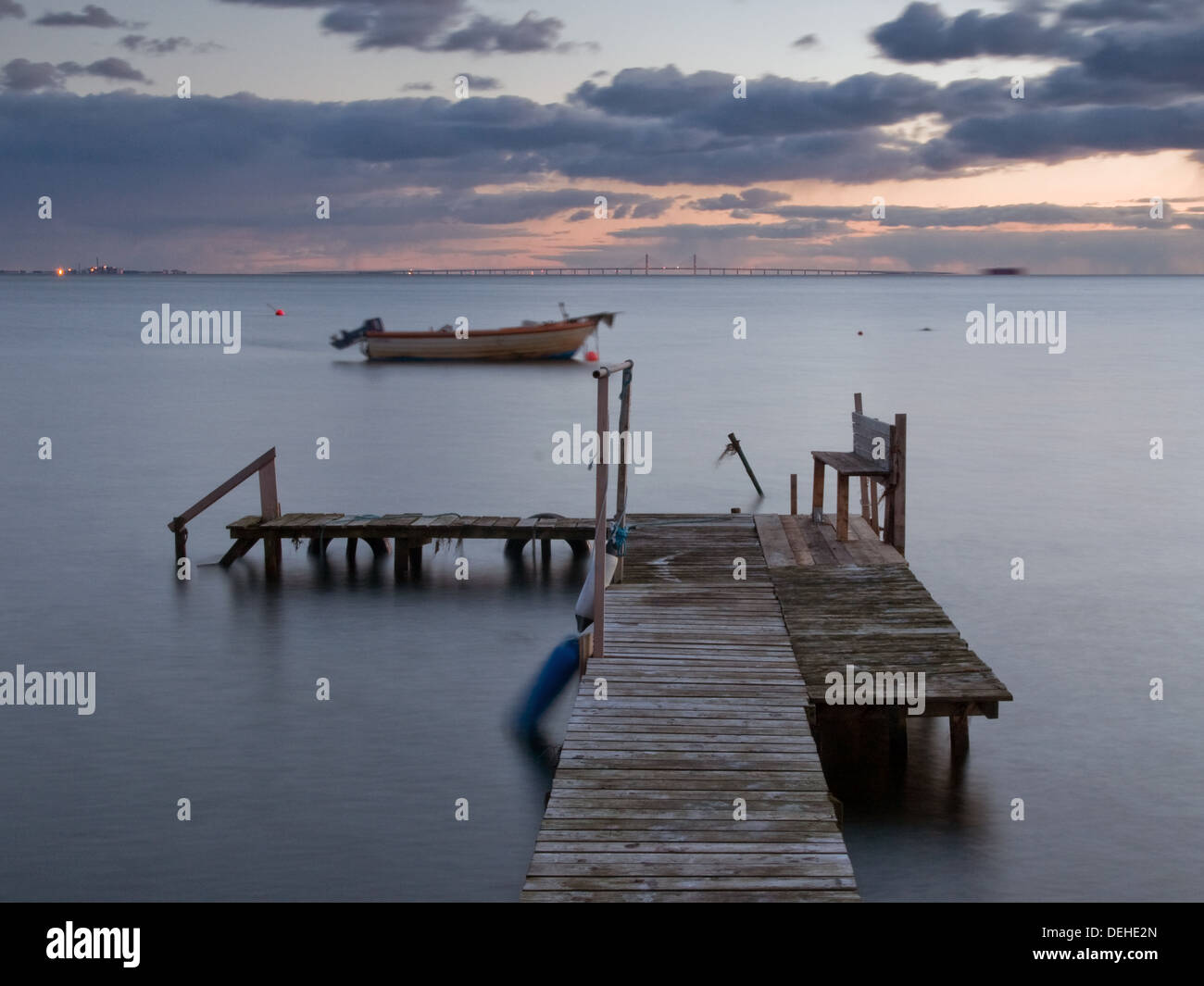 Fishingboat by the jetty Stock Photo - Alamy