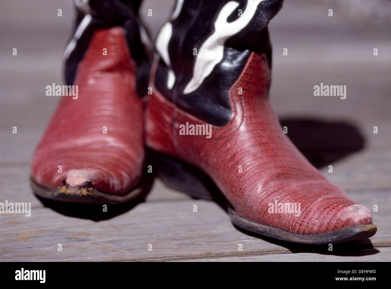 Worn out cowboy boots hi-res stock photography and images - Alamy
