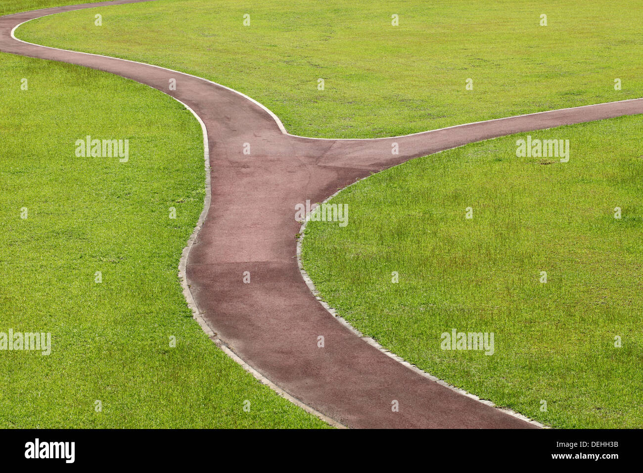curvy walk way in public park Stock Photo - Alamy