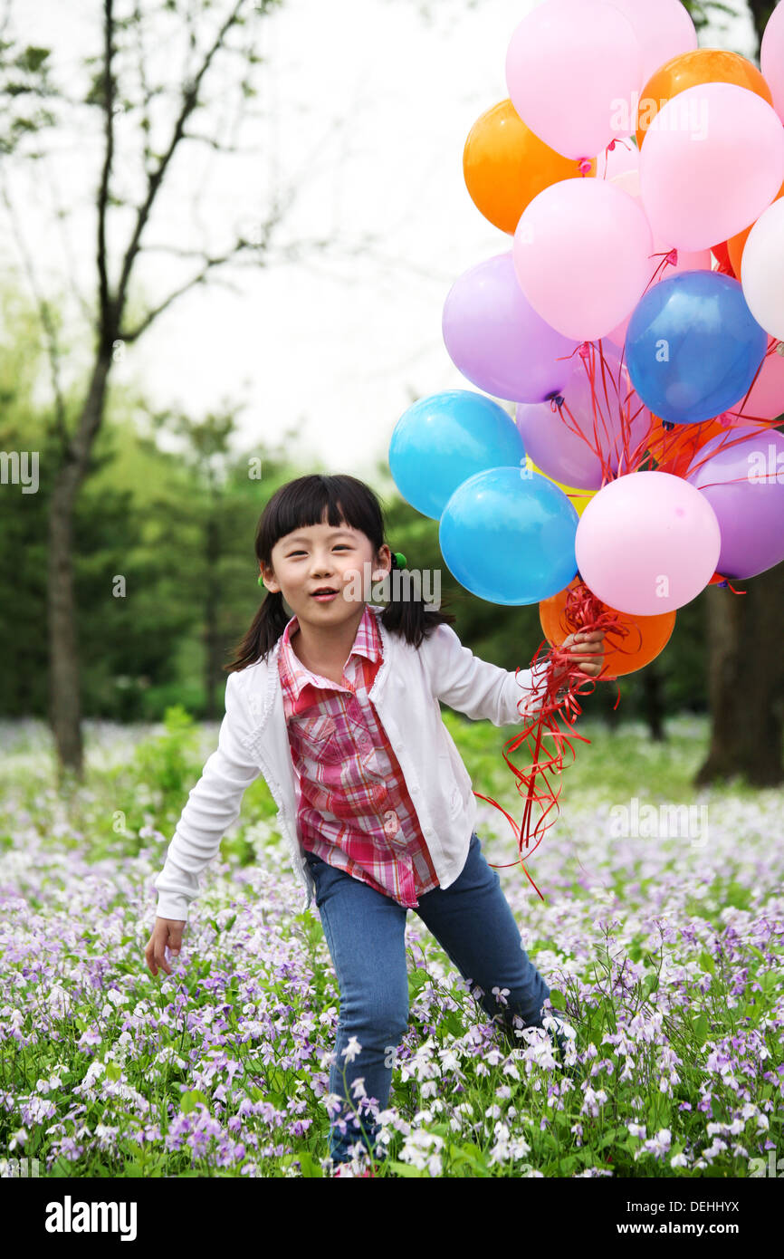 Oriental children playing outdoors Stock Photo - Alamy