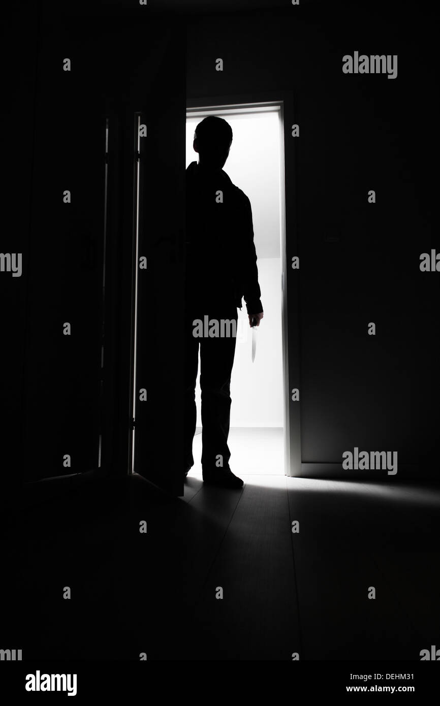 Man entering room Black and White Stock Photos & Images - Alamy