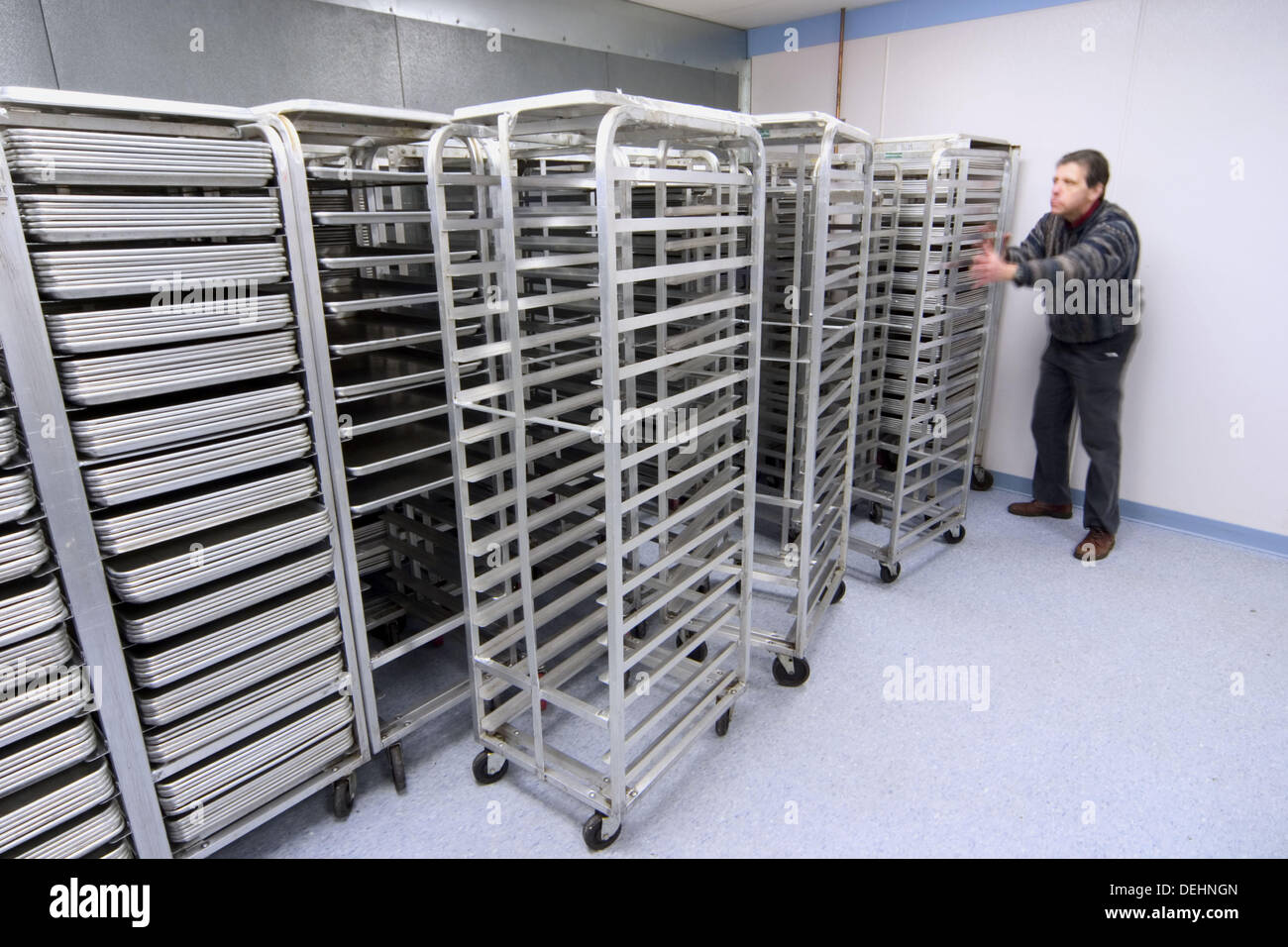 Pushing tray cart hi-res stock photography and images - Alamy