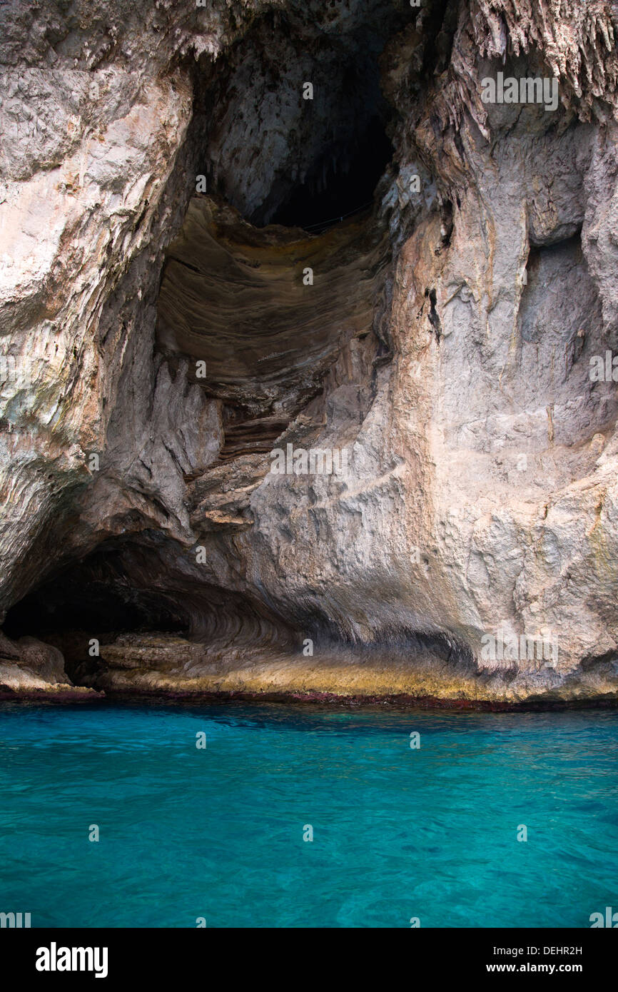 Limestone cliffs and cave in the sea, Capri, Campania, Italy Stock ...