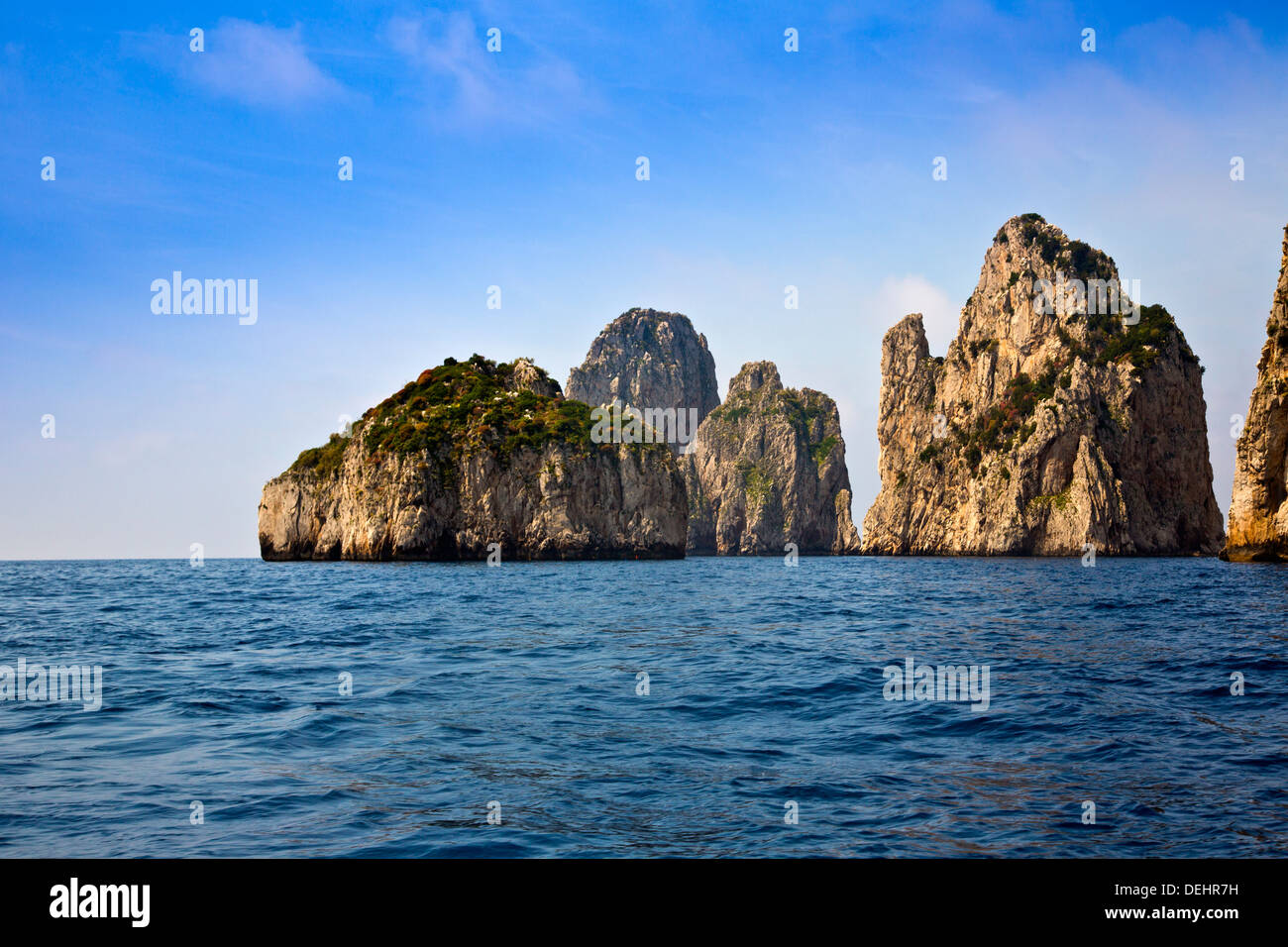 Limestone cliffs and cave in the sea, Capri, Campania, Italy Stock ...