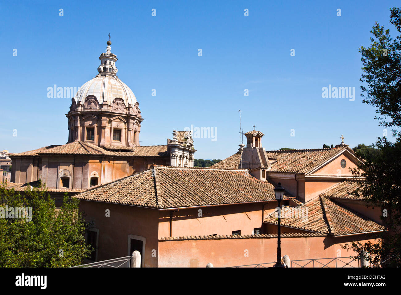 Church dome with roofs of buildings, Rome, Lazio, Italy Stock Photo - Alamy