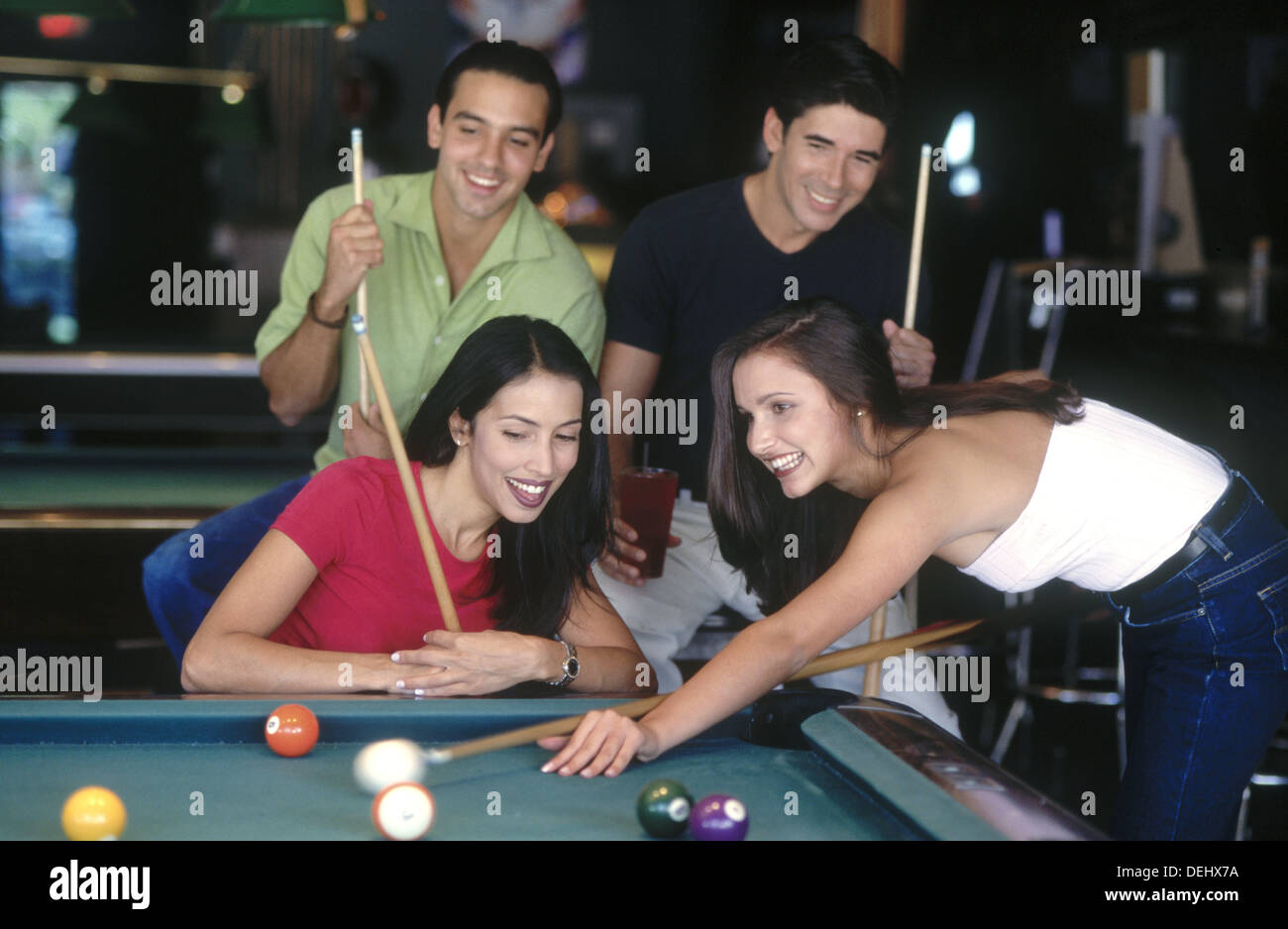 Young man shooting pool billiard hi-res stock photography and images ...