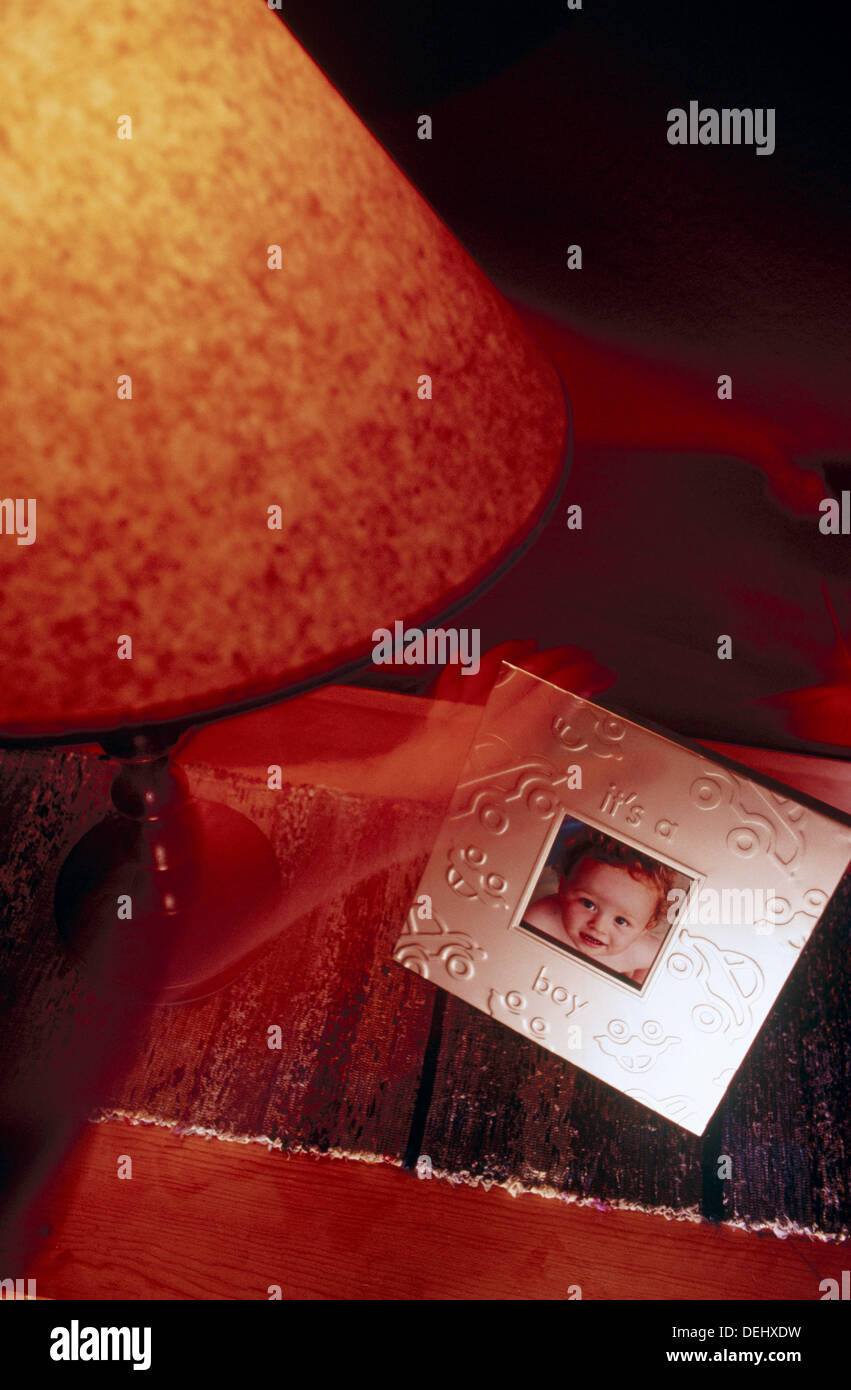 Baby photograph with ghost arm Stock Photo - Alamy