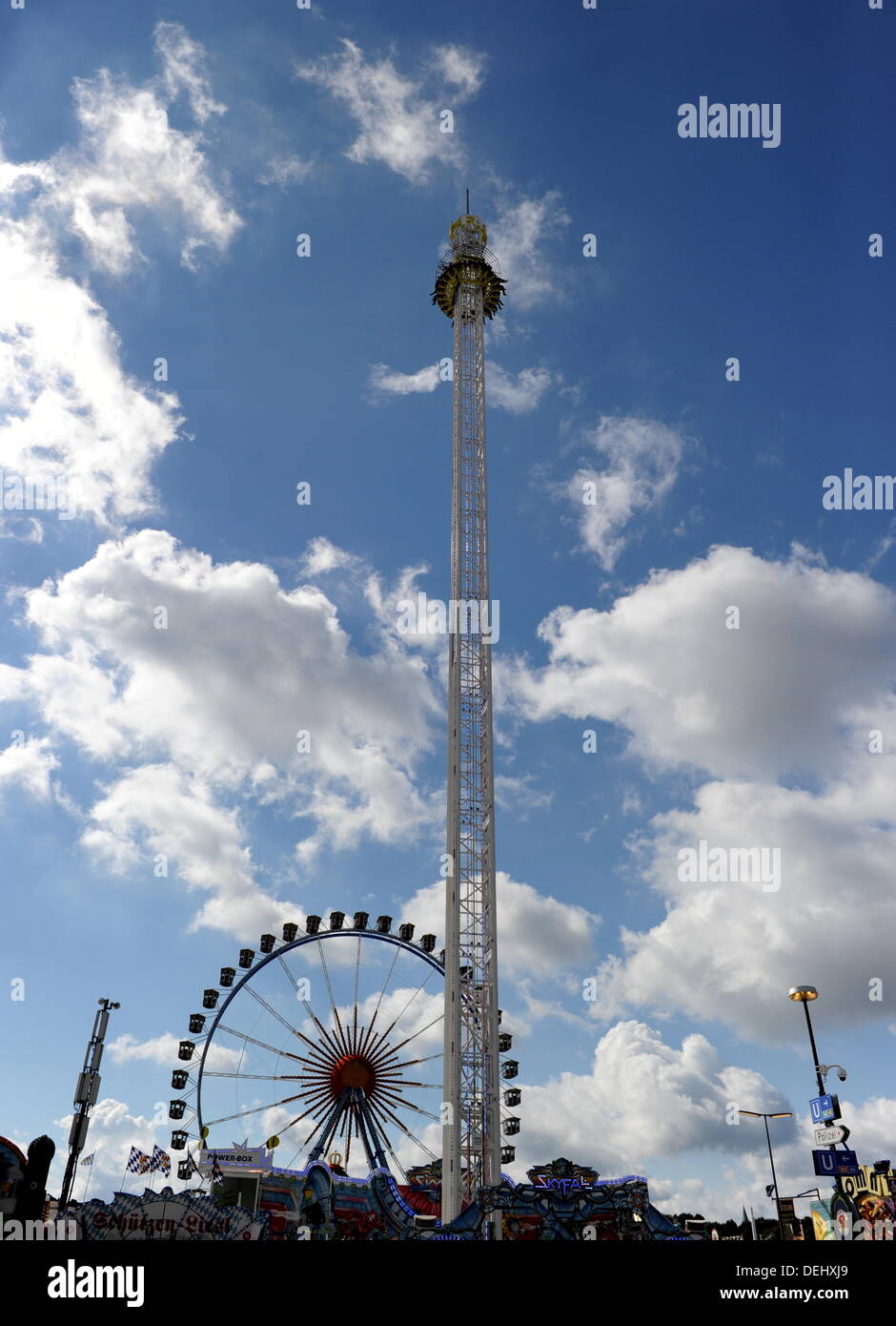 Munich, Germany. 19th Sep, 2013. Journalists ride the 'Skyfall' during ...