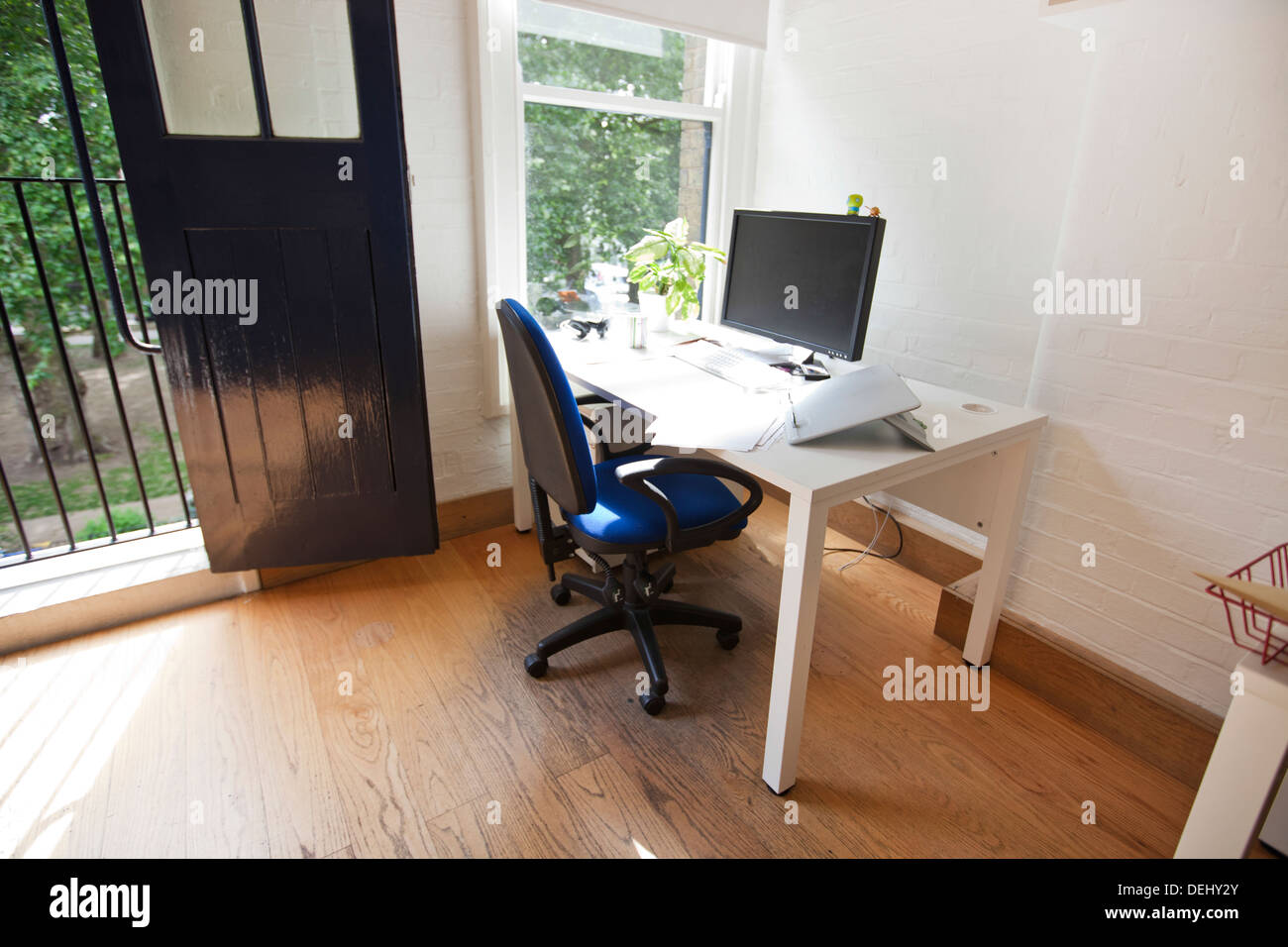 Interior office with computer on desk Stock Photo - Alamy
