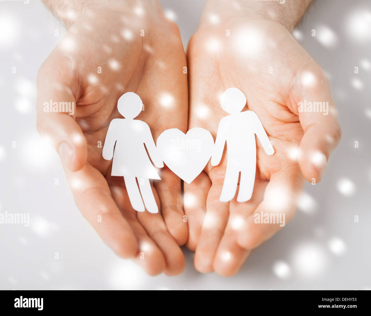 man hands with paper people Stock Photo - Alamy