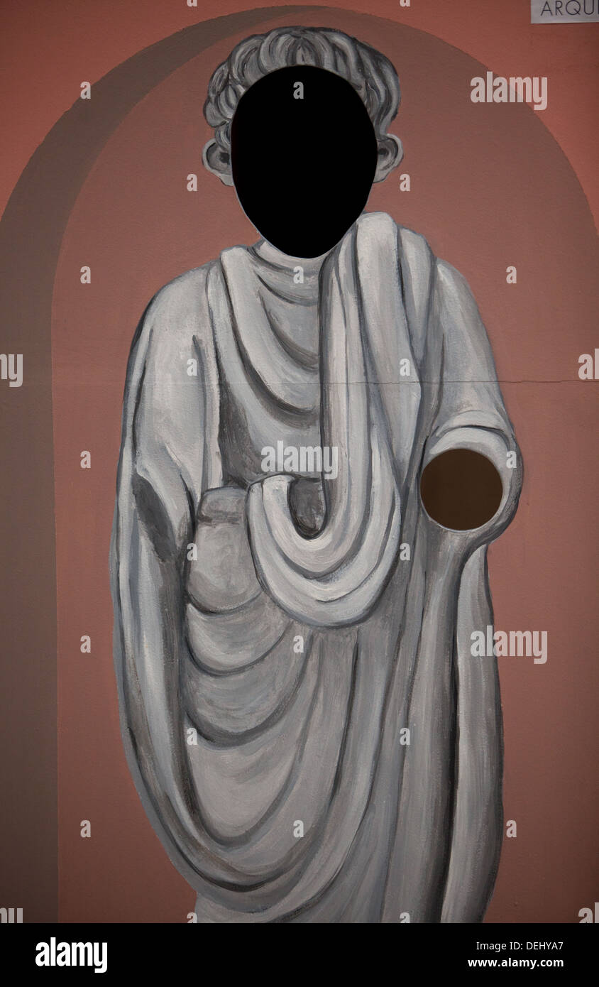 A painting of a Roman noble with the face cut used by tourists to take ...