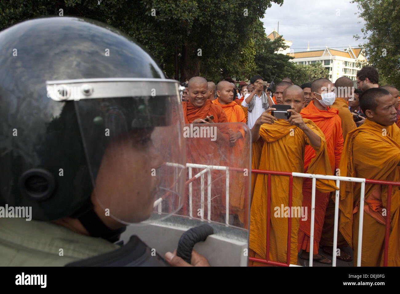 Sept. 19, 2013 - Phnom Penh, Phnom Penh, Cambodia - A monk photographs ...