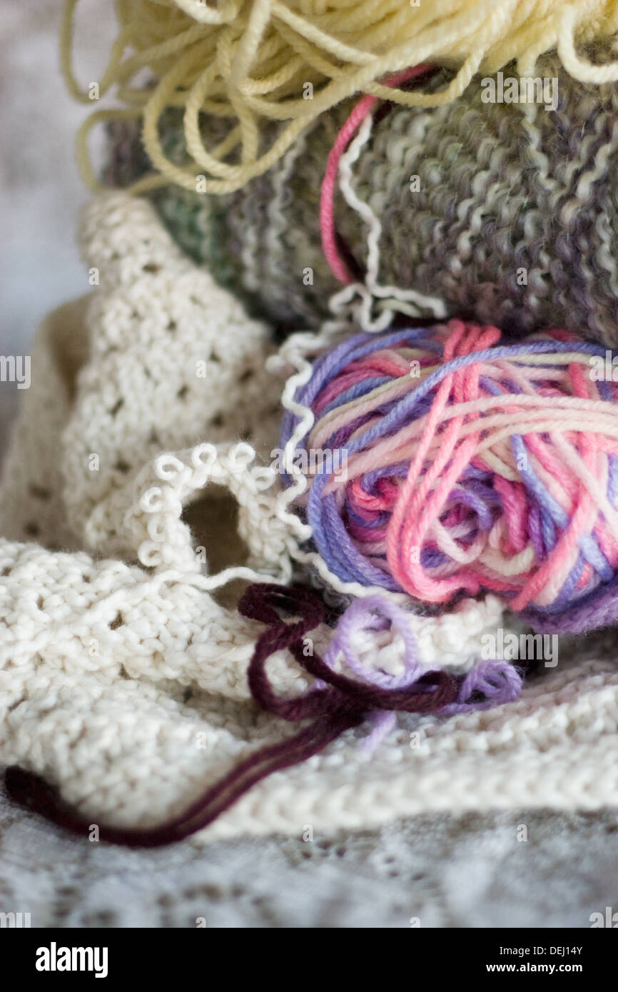 Pile of colourful, messy yarn used for arts and crafts Stock Photo - Alamy