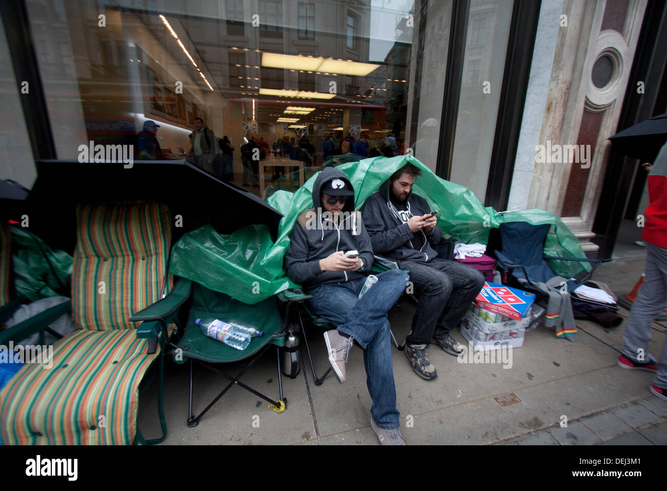 London, UK. 19th Sep, 2013. Apple fans camp outside the flagship store ...