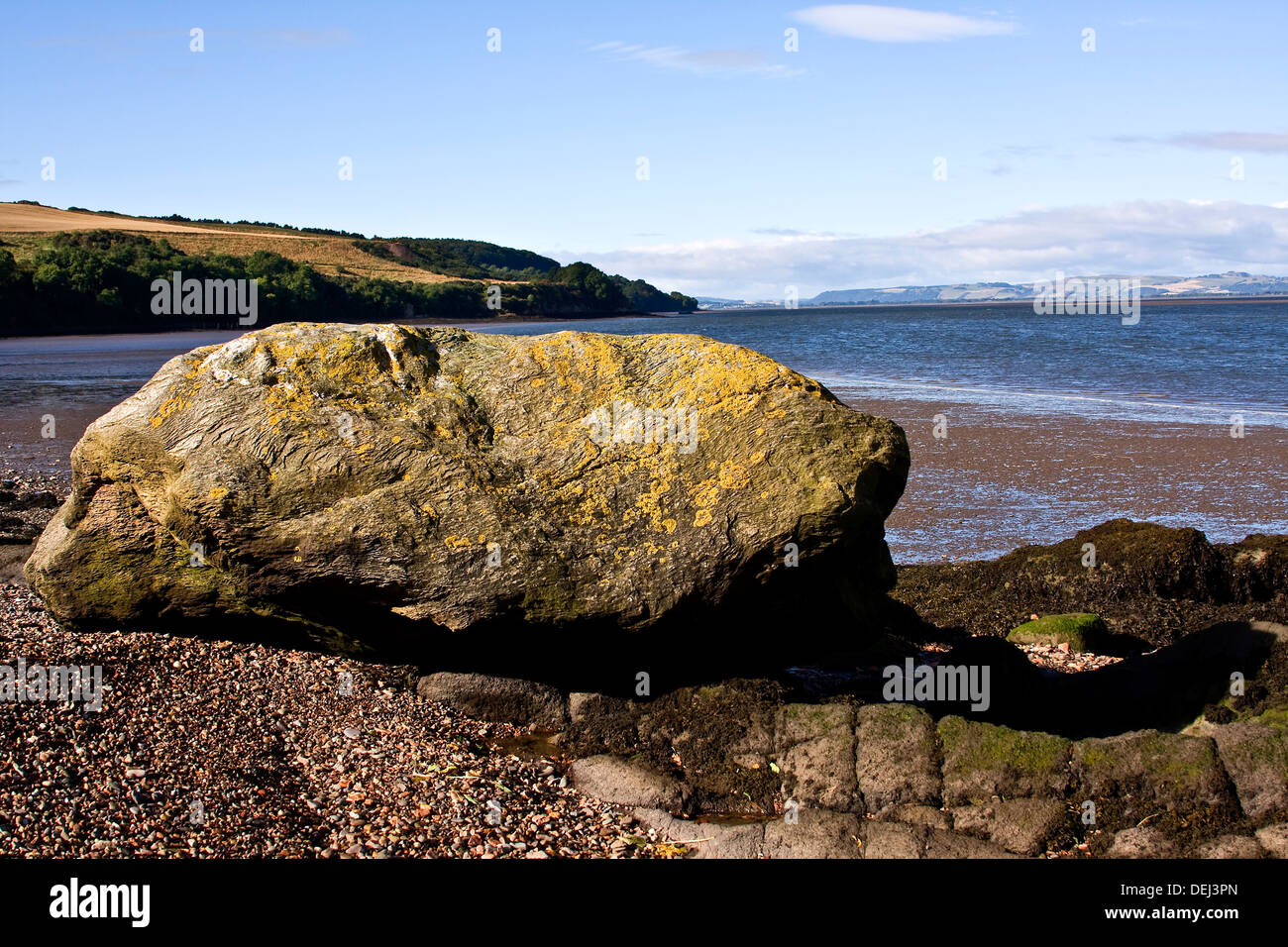 Large rock in the middle of the landscape view on Wormit beach at Fife ...