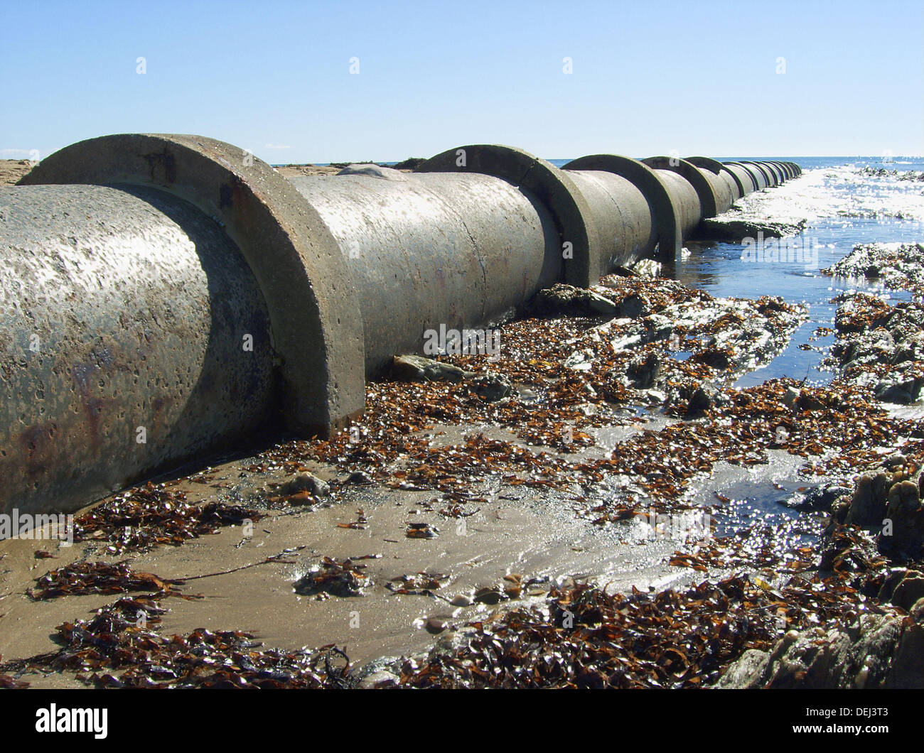 Water outflow pipe on beach hi-res stock photography and images - Alamy