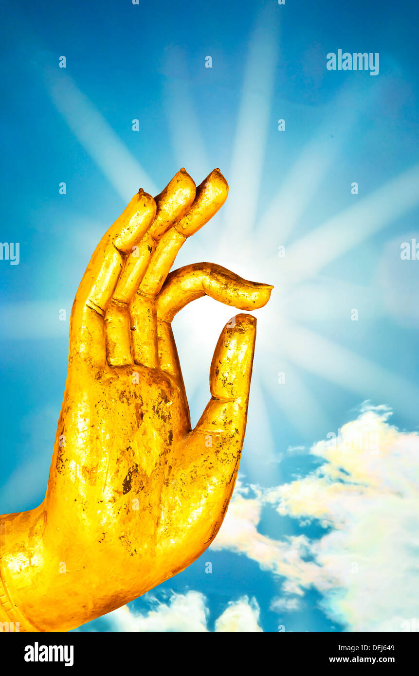 Hand of Buddha on sun light Stock Photo - Alamy