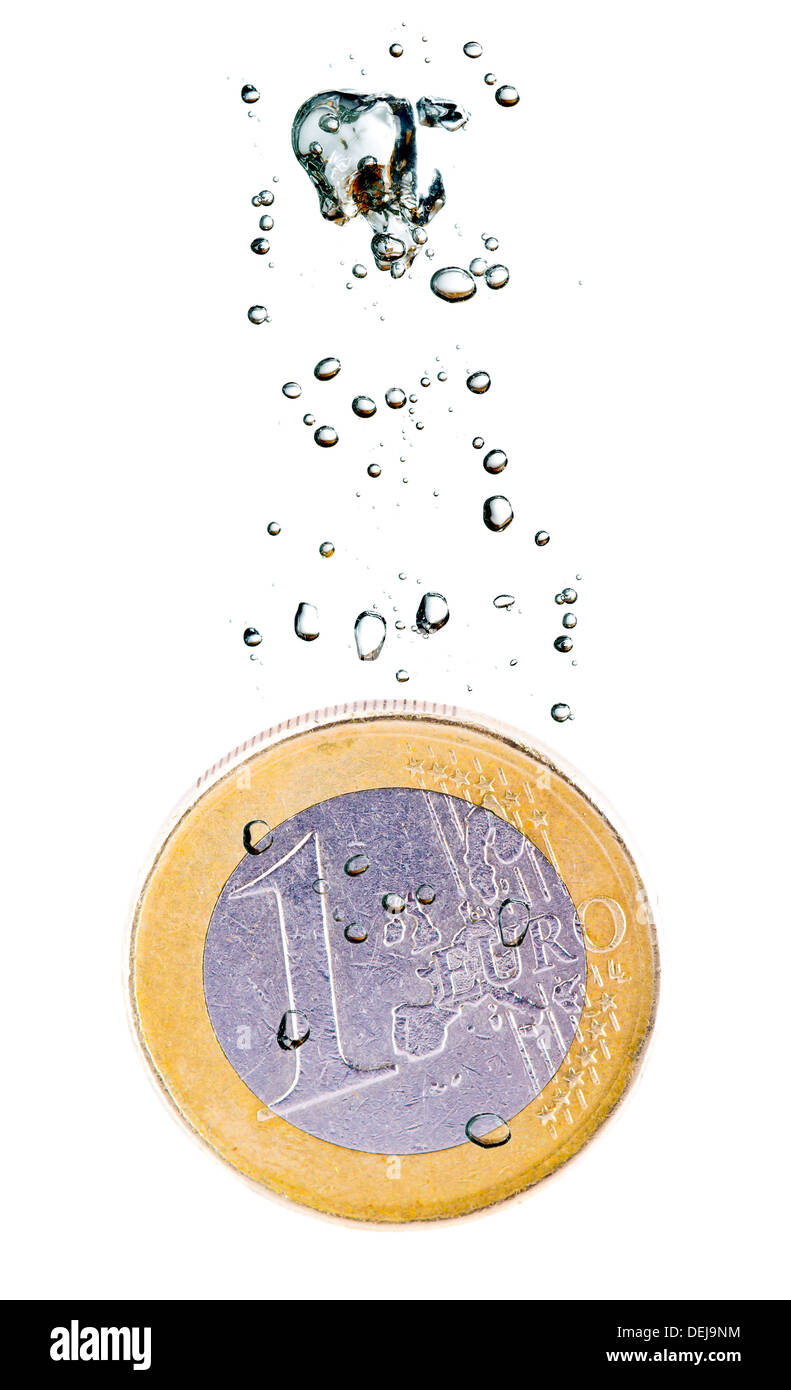 Concept with euro coin sinking in water over a white background Stock ...