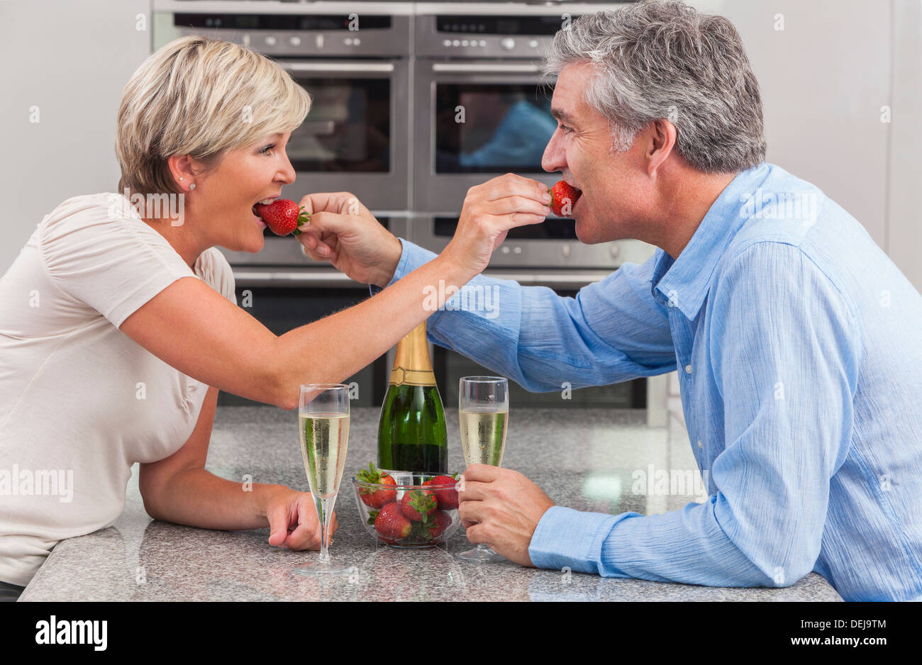 An attractive happy, smiling, romantic man and woman couple sharing ...