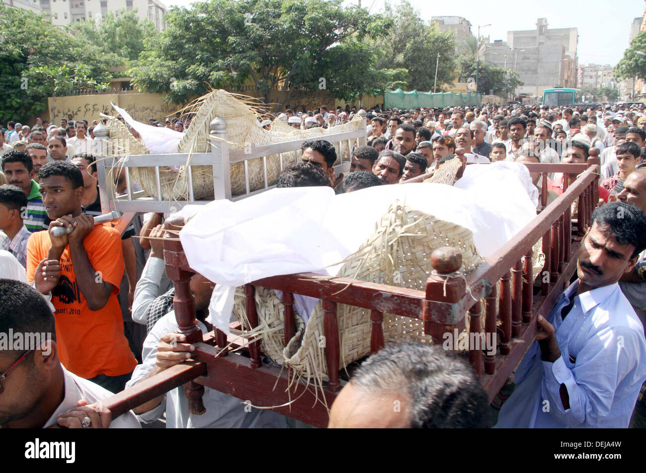 People carry coffin of Zafar Baloch, a prominent leader of the banned ...