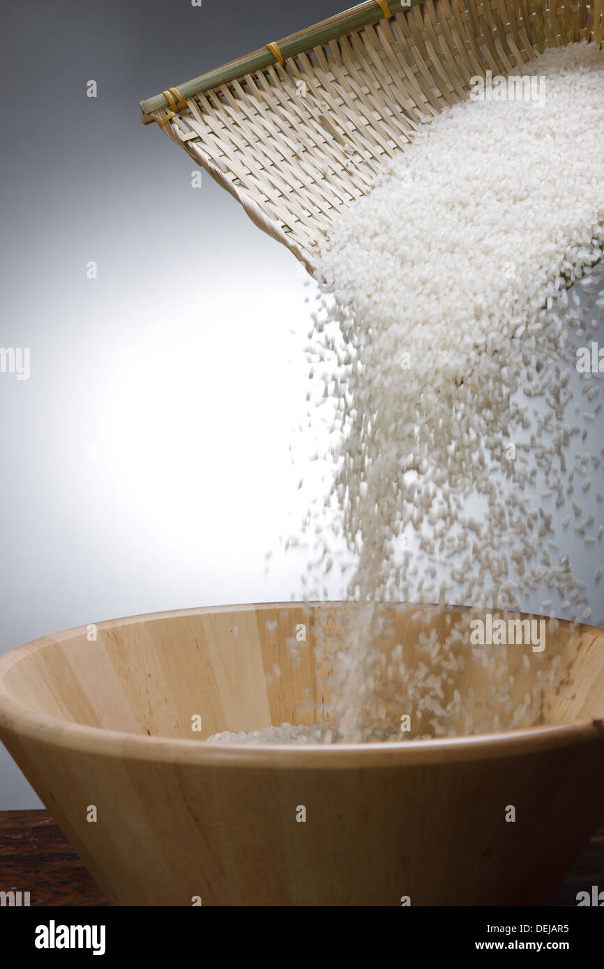 Pouring rice container hi-res stock photography and images - Alamy