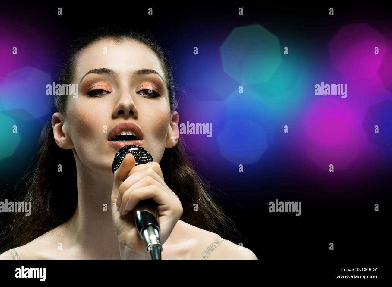 pretty girl singing at the revelry party Stock Photo - Alamy