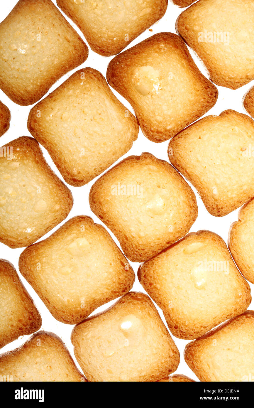 Many small dried rusks bread loaf toast biscuits as texture background ...