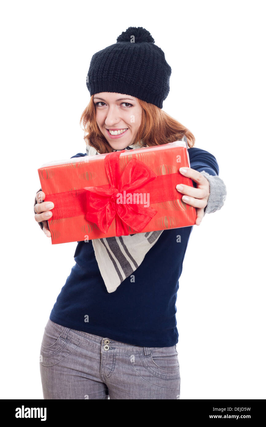 Happy winter woman showing present, isolated on white background Stock ...